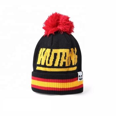 China Custom Jacquard Knit Pom Beanie with Embroidery 58cm Adult Size Wool Hat for sale