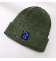 China Knitted Winter Hat Made From Recycled PET Bottles With Woven Patch And Custom Design for sale