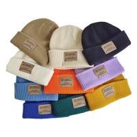 China Custom Woven Label Eco Friendly RPET Acrylic Wool Unisex Cuffed Skull Cap Beanie Waffle Knitted Hat for sale