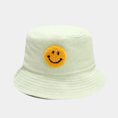 China Custom Embroidered Bucket Hat Organic Cotton Bamboo 230GSM Fisherman Hat with Logo Badge for sale
