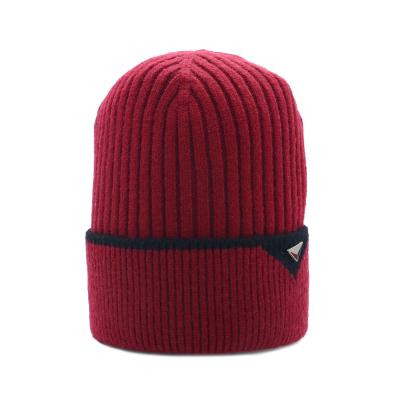 China Custom Knitted Winter Beanie Hat with Pom Pom 100% Acrylic One Size for sale