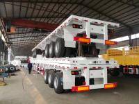 China Customizable Flat Bed Semi Trailer with 40-60t Load Capacity, High-strength Steel Construction, and 3 Axles for Heavy-Duty Transport for sale