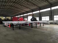 China Customizable Flat Bed Semi Trailer with 12 R22.5 Radial Tires and 40-60t Load Capacity Built from High-strength Steel for sale