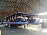 China 12R225 Tubeless Tires Flat Bed Semi Trailer Mechanical Suspension Heavy Duty Steel Flatbed Trailer for Cargo Transport for sale