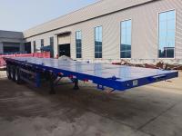 China 3Axle 13t Flat Bed Semi Trailer Heavy Load Flatbed Semi Truck Trailer Built for Hauling of Machinery and Oversized Cargo for sale