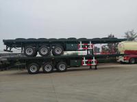 China 40 to 60 tons loadcapacity container flatbed semi trailer heavy duty flat bed semi trailer for transporting large cargo for sale