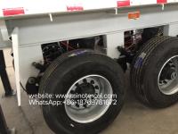 China 6 Axle 45CBM Dump Semi Trailer with Liftable Front 2 Axles Air Suspension for sale