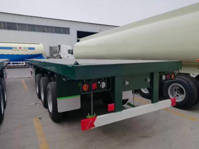 China 3 Axles Flat Bed Semi Trailer Demission Of Flat 12500 2500 1600mm Durable Trailer Designed For Safe And Freight Hauling for sale
