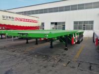 China 3 Axles Flat Bed Semi Trailer Demission Of Flat 12500 2500 1600mm Durable Trailer Designed For Safe And Freight Hauling for sale