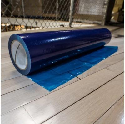 China Laminated 1250mm x 1000m Floor Protection Film with 500g/25mm Adhesive Strength for Industrial Surface Protection for sale