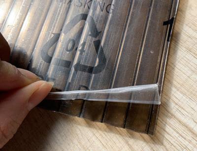 China Corrugated Board Removable Protective Film Tape - 60-70°C Heat Resistance, 250-300% Elongation for Plastic Surface Protection for sale