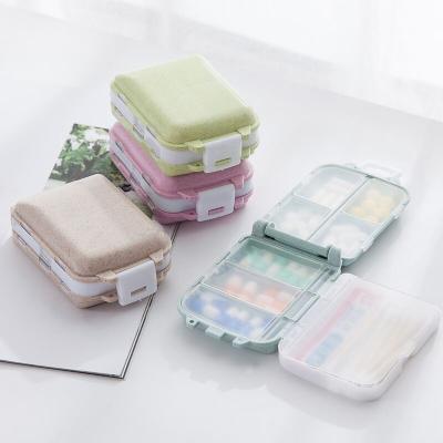 China Portable Medicine Vitamin Holder Container Pill Case Cute Small Pill Organizer with 8 Compartments for sale