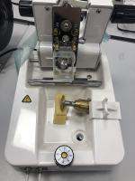 China Shiny Silver Auto Lens Grooving Machine for CR39 Lenses - 0.65mm Groove Width, 28-70mm Lens Diameter for sale