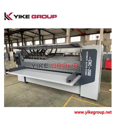 China YIKE GROUP 2750MM CNC Servo Motor PLC Control Thin Blade Slitter Scorer Machine With Auto Change Order for sale