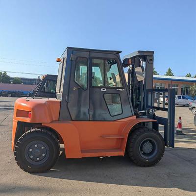 China FD60 6.0T Diesel Counterbalance Forklift Truck Japanese Engine With Cabin for sale