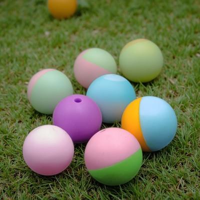 China High Elasticity Wear Resistance Silicone Ball for Cats and Dogs Safe Non-toxic Perforated Pet Toy for sale