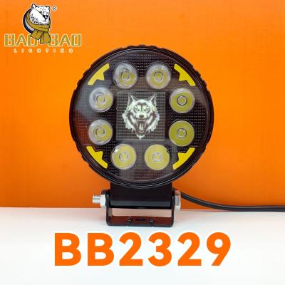China Circle Universal Red Metal White Yellow Dual Color Motorcycle LED Headlight Car Work Light for sale