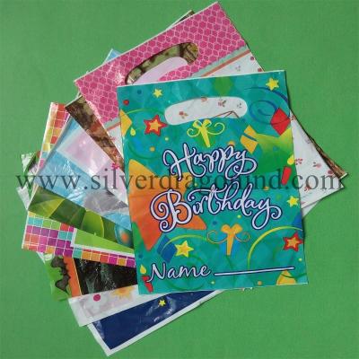 China Well-printed Plastic Carrier Bag with die cut handle for shopping use for sale