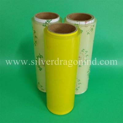 China FDA approved PVC Cling wrap size 10microns x 300mm x 0.65kg N.W.+0.6kg core for sale