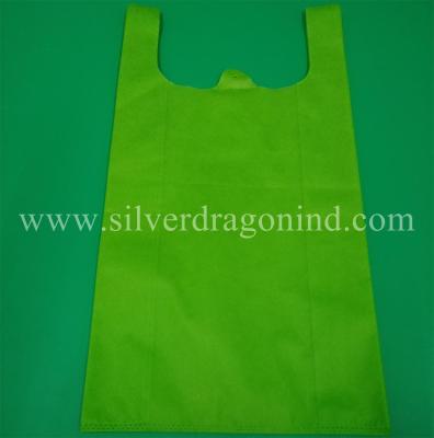 China 30gsm large non woven T-shirt shopping bag in green color, 100% virgin, eco-friendly for sale