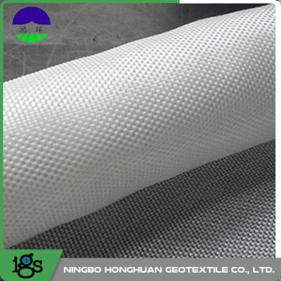 China PET White Multifilament Woven Geotextile 260 g/m² with 65 kN/m Tensile Strength for Railway Construction for sale