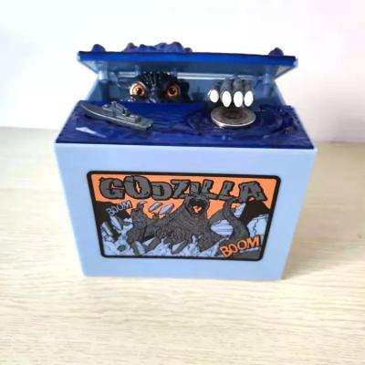 China Godzilla Monster Dinosaur Moving Musical Electronic Coin Piggy Bank 35x25x10cm ABS for sale