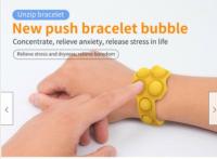 China Silicone Pop It Fidget Wristband Stress Relief Toy for Kids 2 Pack Adjustable for sale