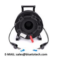 China Waterproof Tactical LC to LC 4Fiber Fiber Optic Patch Cord with Metal Cable Trolly for Outdoor Armored Applications for sale