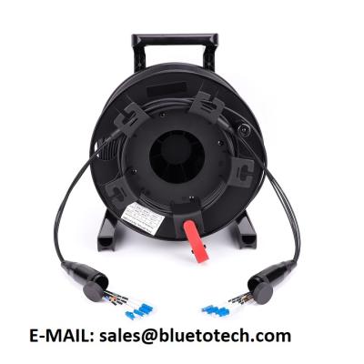 China Waterproof Tactical LC to LC 4Fiber Fiber Optic Patch Cord with Metal Cable Trolly for Outdoor Armored Applications for sale