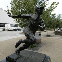 China Custom Folk Art Bronze Baseball Player Sculpture Highlighting Standing Man and Bat for sale