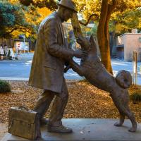 China Outdoor Garden Decor Custom Engraved Antique Classical Metal Cowboy with Dog Sculpture for sale