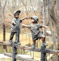 China Custom Sports ball figure family child cast copper bronze sculpture For Sale for sale