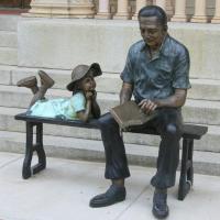 China Custom Life Size Sitting On Bench Bronze Figure Man Sculpture For Outdoor for sale