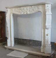 China Indoor Marble Sculpture French Fireplace with Black Insert and Custom Hand Carving for sale