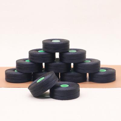 China Rayon Embroidery Thread Dyed Polyester Bobbins v69 T70 Bonded Thread for Sewing Needs for sale