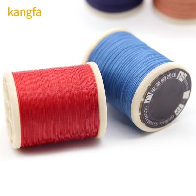 China 30g 0.6mm High Tenacity Filament Cored Sewing Thread for Polyester Bonded Waxed Thread for sale