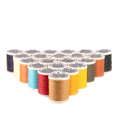China 0.55mm Waterproof Polyester Bonded Round Waxed Thread for Leather Sewing Hand Knitting for sale