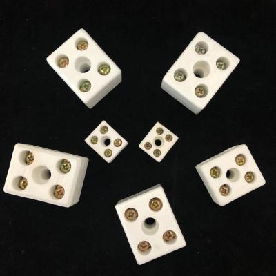 China Steatite Ceramic Wire Connector Block Heat Resistant 1100C 2.8 g/cm3 for sale