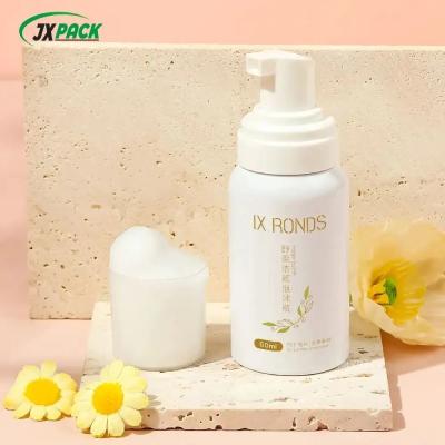 China Luxury Black Mousse Foaming Bottle 80ml 100ml PET Cosmetic Liquid Soap Dispenser With Foam Pump Bottle for sale