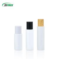 China PET Plastic Cosmetic Bottle with Wooden Cap 60ml 80ml 100ml for sale