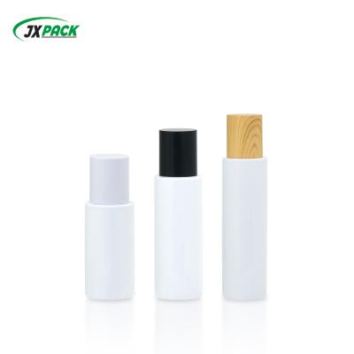 China PET Plastic Cosmetic Bottle with Wooden Cap 60ml 80ml 100ml for sale