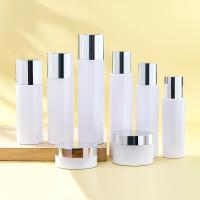 China White Cream Jar and Toner Bottle Set with Electroplated Silver Cap Leak-proof and Recyclable Materials for Premium Cosmetic Packaging for sale