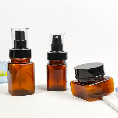 China Amber Square Plastic Cosmetic Bottle Set for Skincare - Lightweight & Durable Cosmeceutical Packaging for sale