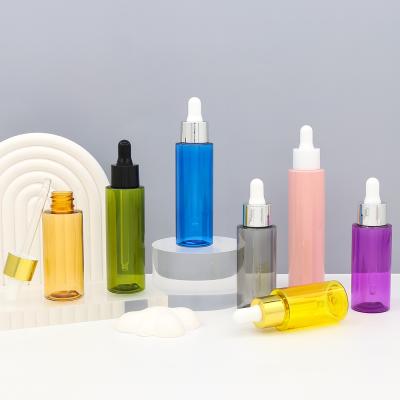 China Custom Color PET Plastic Dropper Bottle with Gold/Silver Collar and Precision Dropper for Cosmetic Serum Packaging for sale
