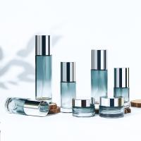 China Luxury Gradient Glass Cosmetic Bottle with Leak-Proof Sealing and Customizable Options for Premium Skincare Packaging for sale