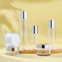 China Transparent Plastic Cosmetic Bottle with Leak-Proof Design and Electroplated Silver Caps for Premium Skincare Packaging for sale