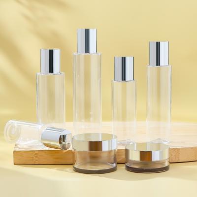 China Luxury Thick Wall Plastic Cosmetic Bottle with Electroplated Silver Cap and Leak-Proof Design for sale