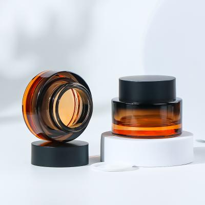 China Amber Glass Cream Jar with Black Lid – Thick Bottom Cosmetic Glass Jar Manufacturer & Supplier for sale
