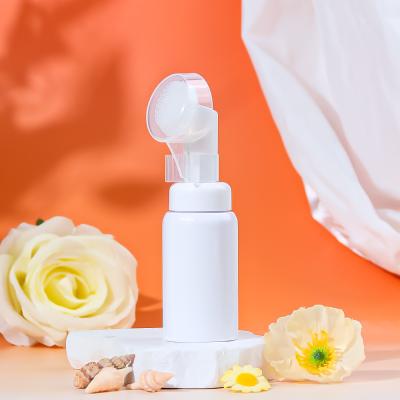 China Custom Silicone Brush Foam Pump Bottle with Soft Silicone Brush and Leak-Proof Design for Facial Cleanser for sale