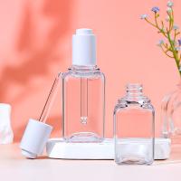 China PETG Square Thick Wall Transparent Push Button Dropper Bottle Customizable for Skincare Packaging for sale